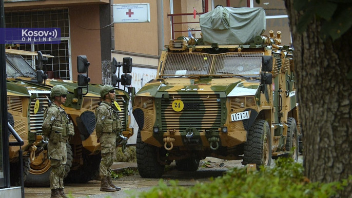 Zvecan: A metal fence from the side entrance of the municipal building ...